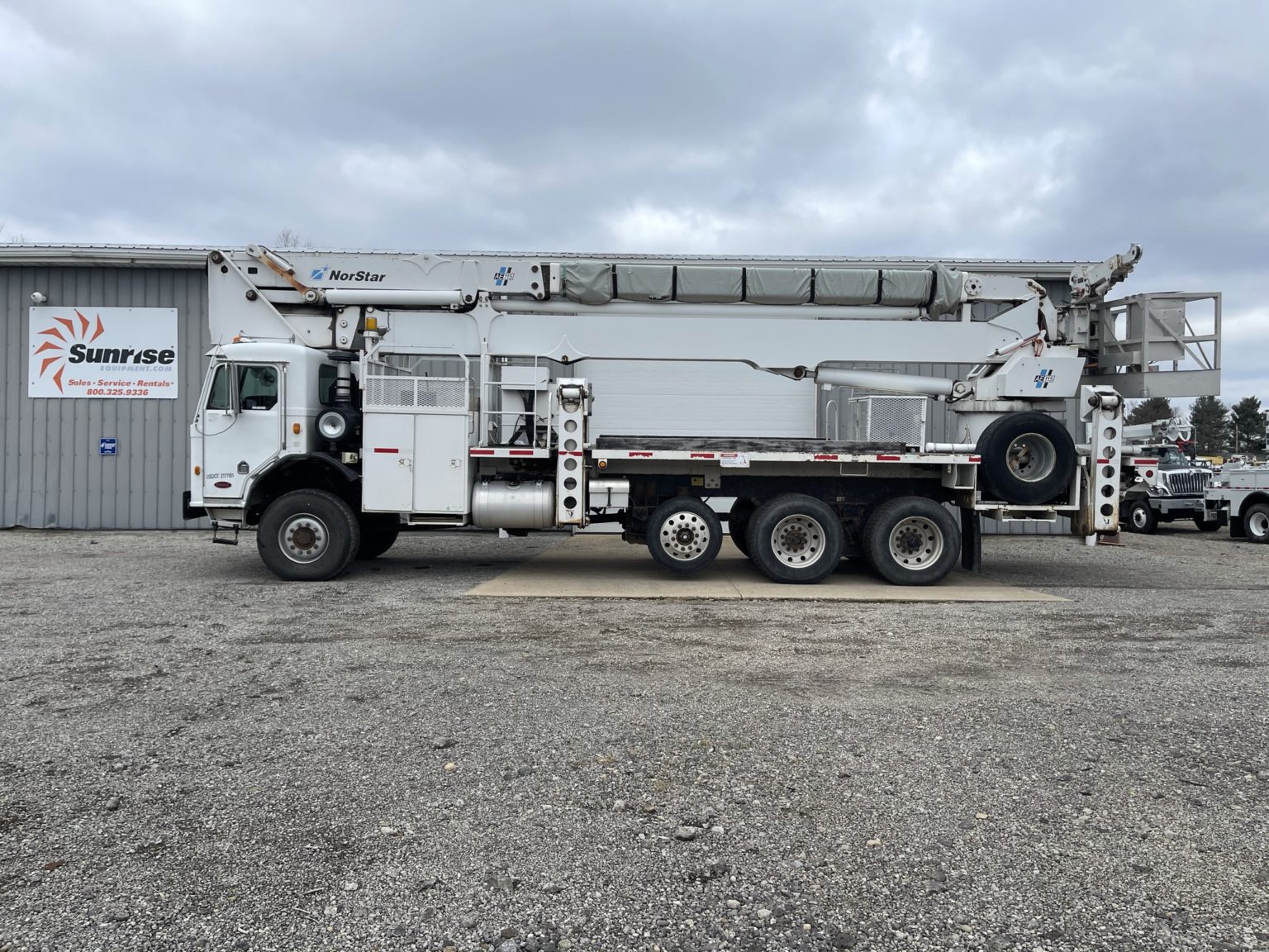 120' Norstar on 2002 Peterbilt 320 6x6 chassis w/ Cummins Engine
